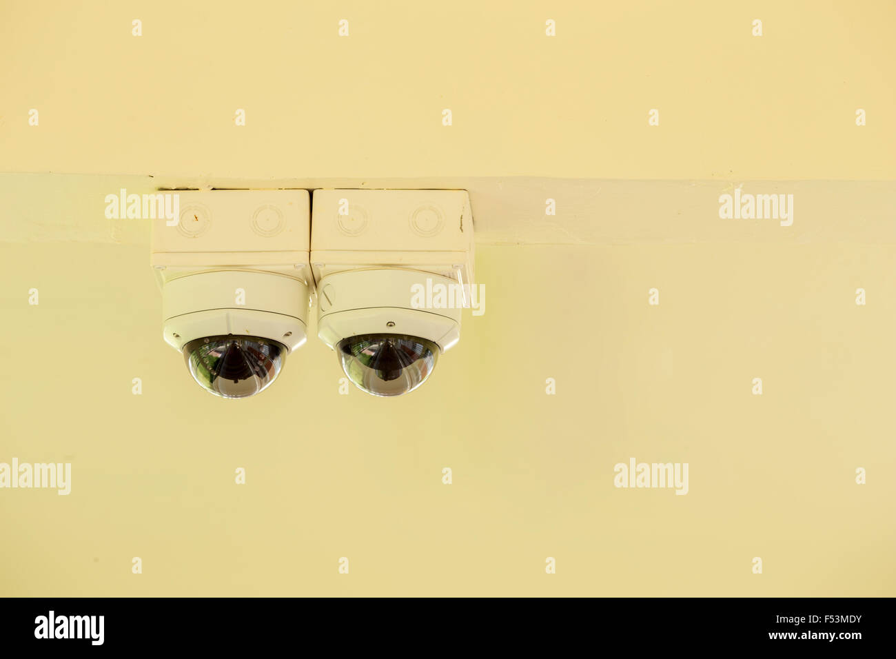 CCTV Security camera wall ceiling Stock Photo - Alamy