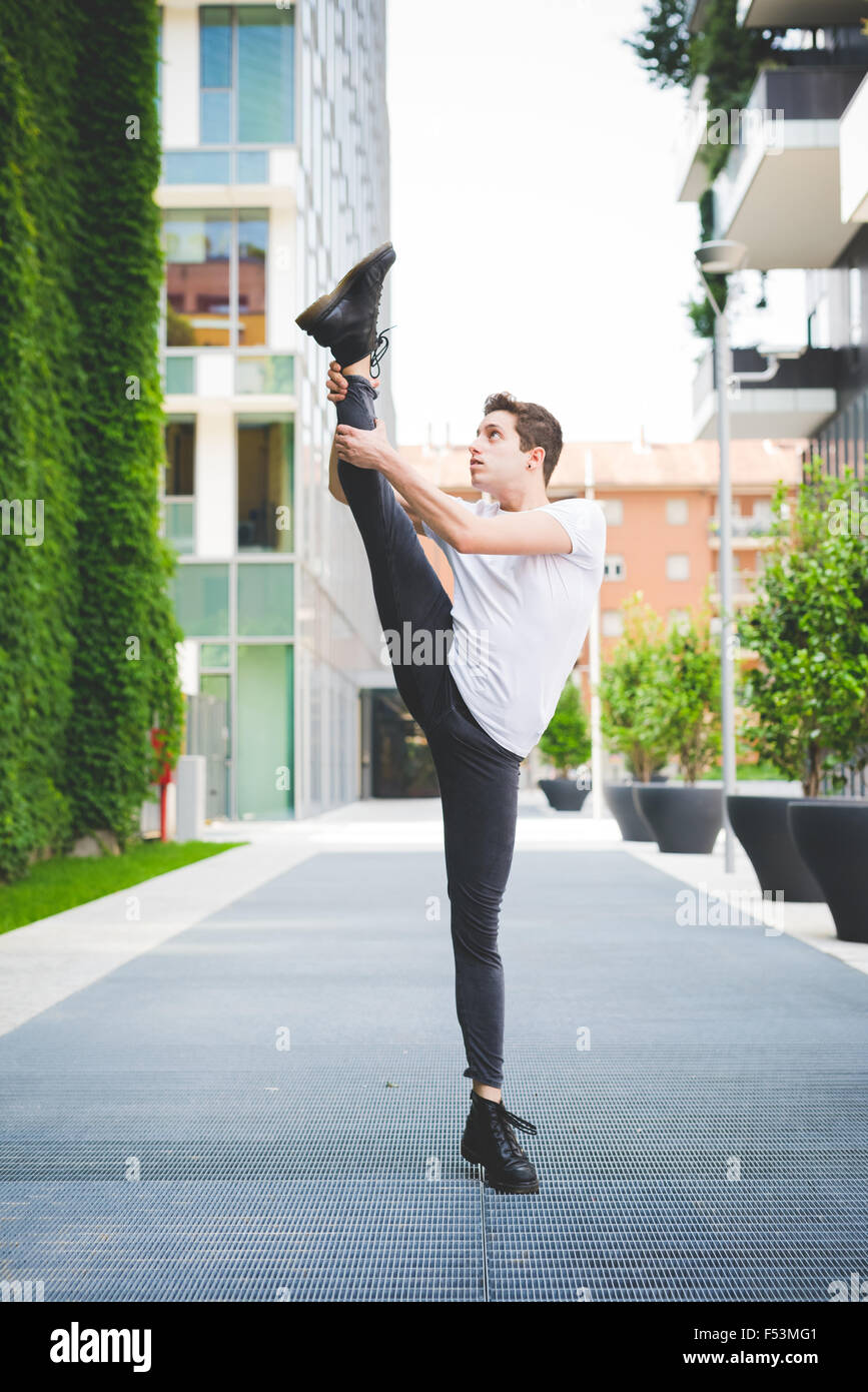 Young handsome caucasian brown hair man ballet dancer posing and ...