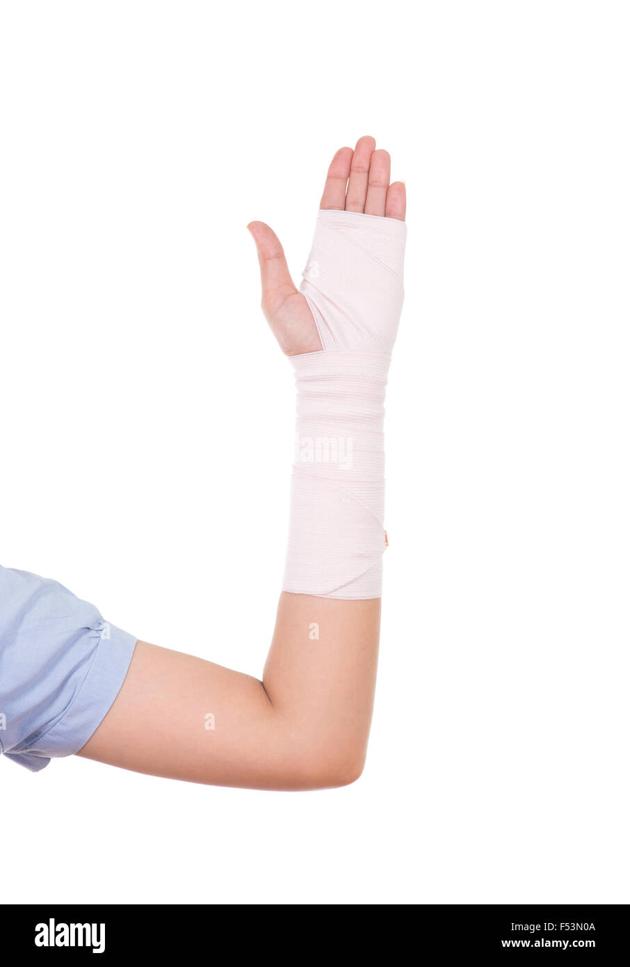 close-up injured arm wrapped in an Elastic Bandage isolated on white ...