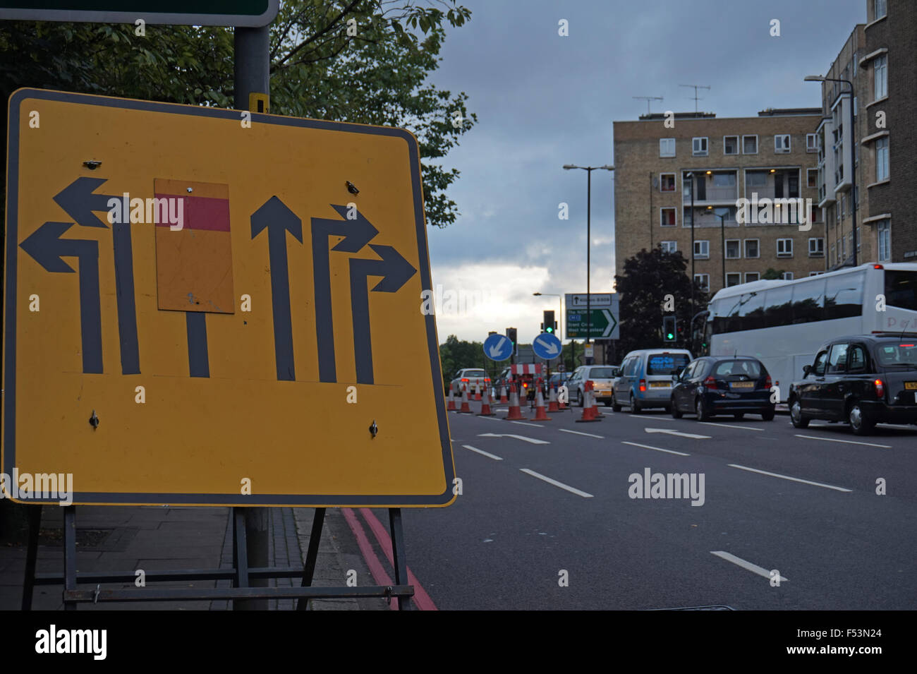 A temporary road sign for roadworks blocking a lane on Adelaide Road ...