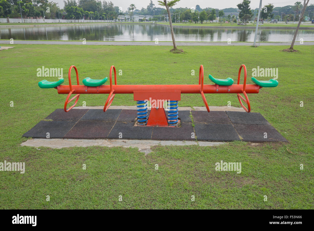 Playground with seesaw hi-res stock photography and images - Alamy