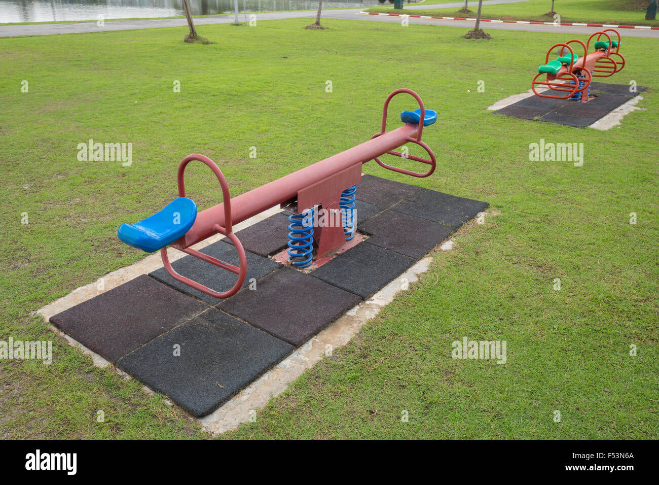 Seesaw on a children playground in the public park Stock Photo - Alamy