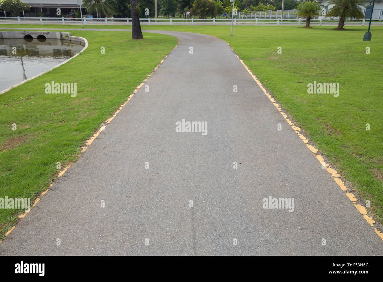 empty running lane in the public park Stock Photo - Alamy