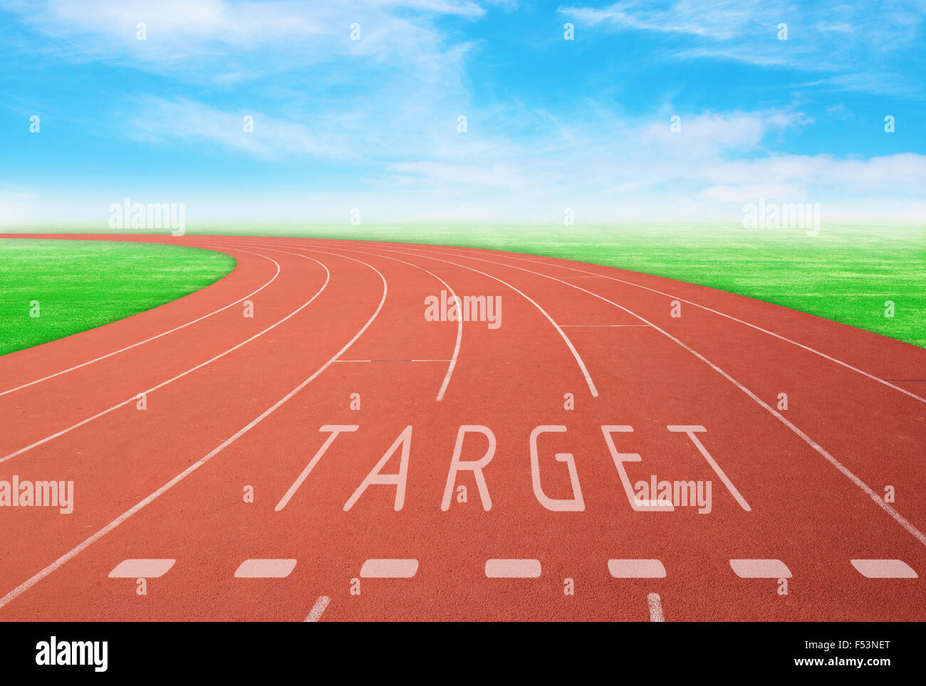 empty outdoor running track with sign target with blue sky background ...