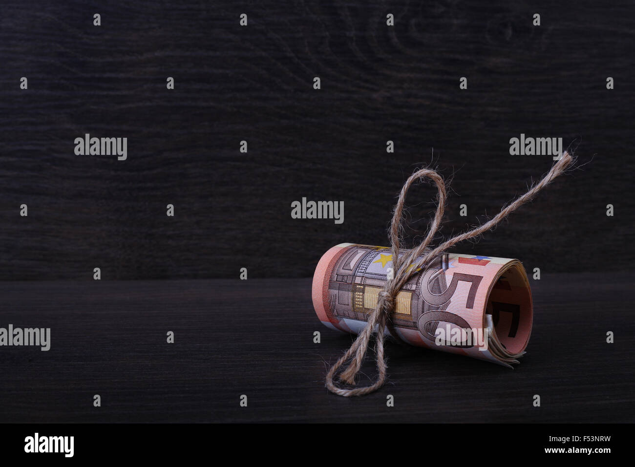 Rolled up banknotes hi-res stock photography and images - Alamy