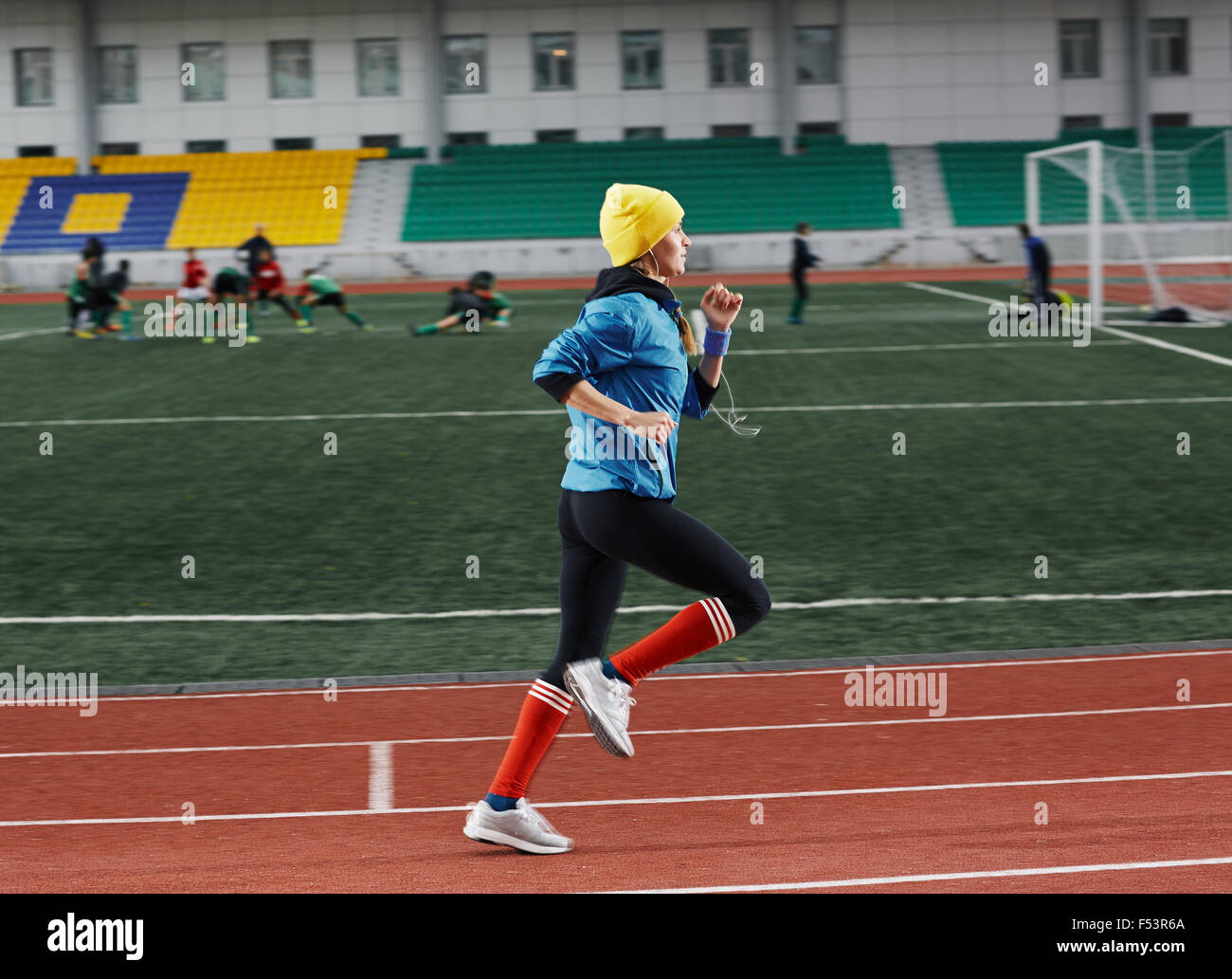 Young sprinter training before competition Stock Photo - Alamy