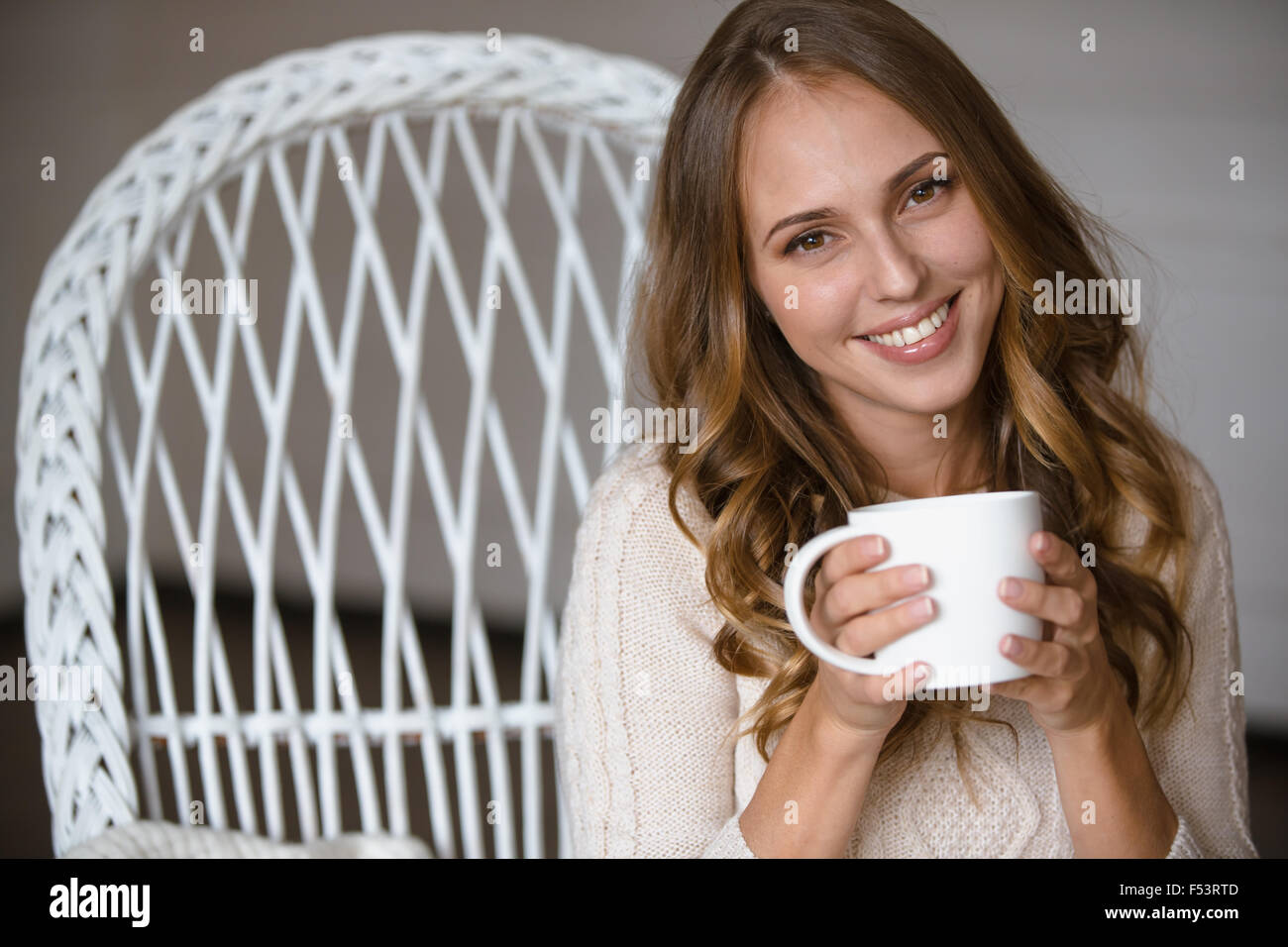 Girl with cup of coffee Stock Photo - Alamy