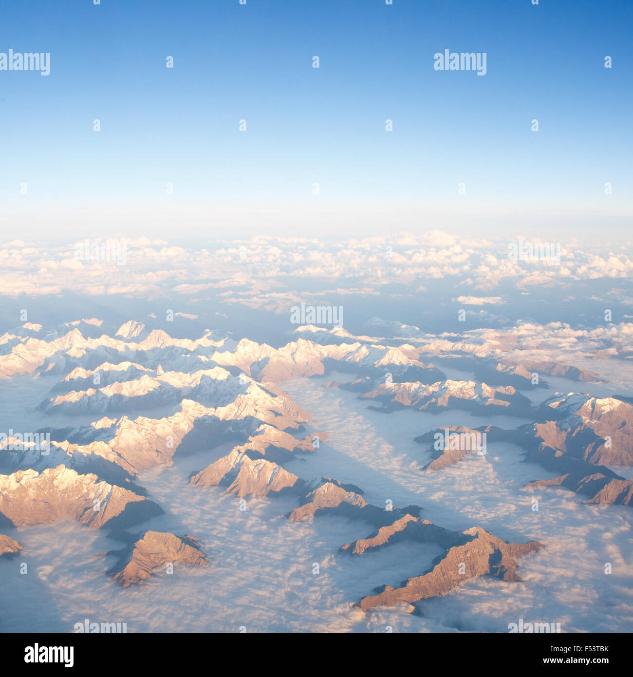 Mountains view from plane window Stock Photo - Alamy