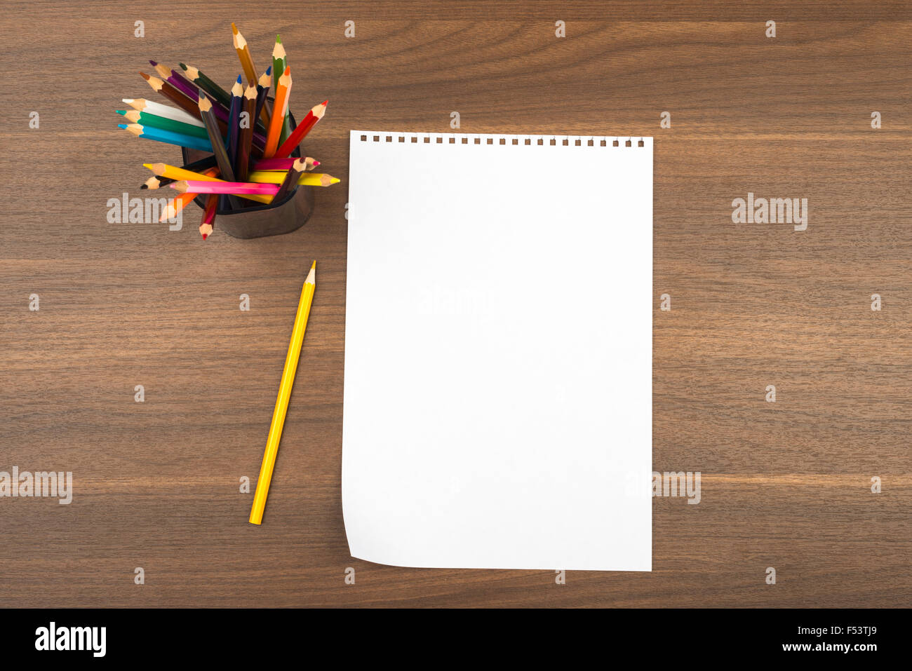 Blank note leaf with crayons Stock Photo - Alamy