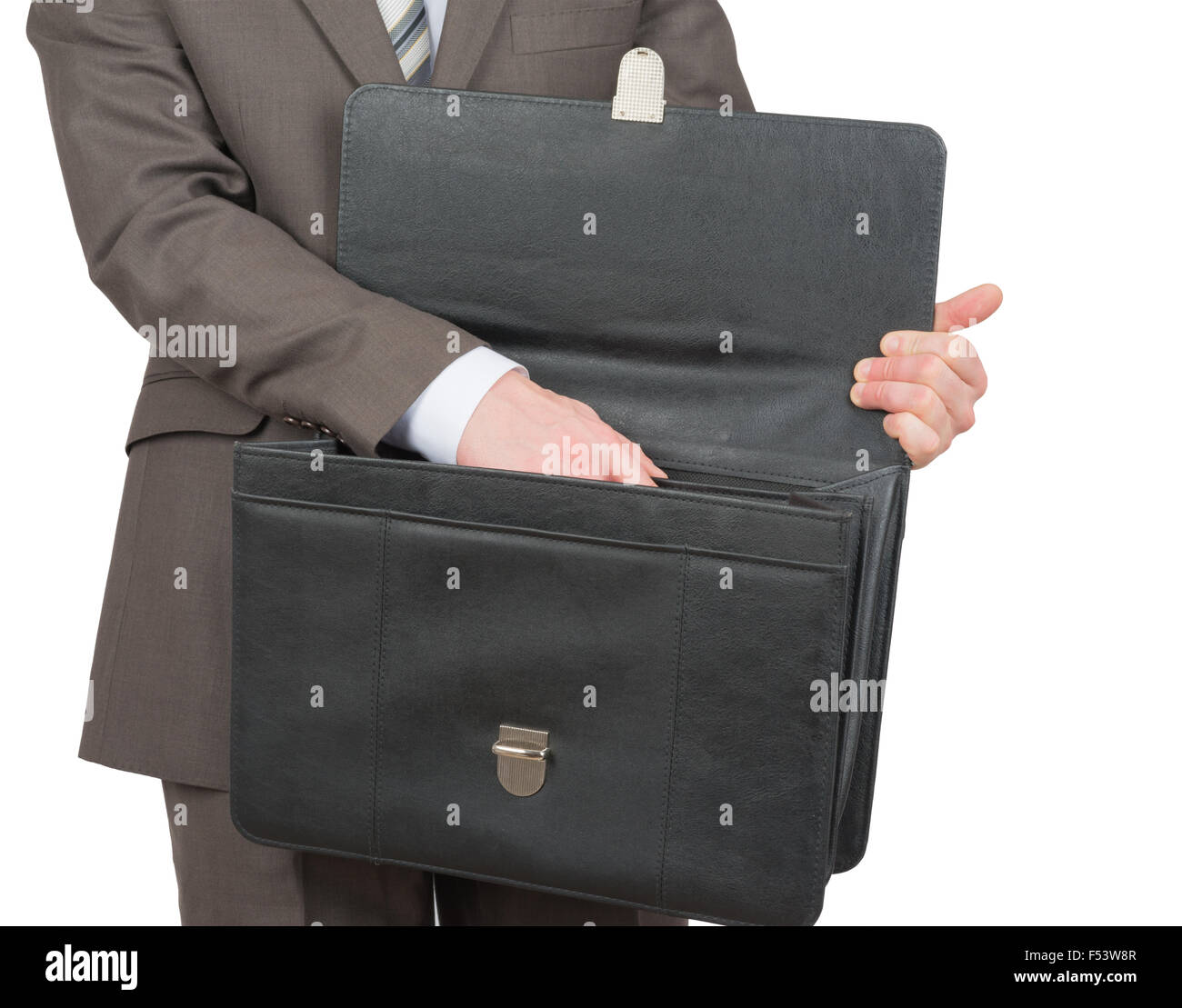 Businessman with opened case, front view Stock Photo - Alamy