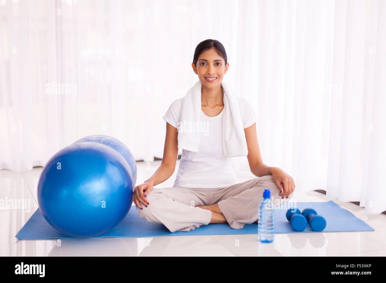 portrait of happy young Indian woman exercise at home Stock Photo - Alamy