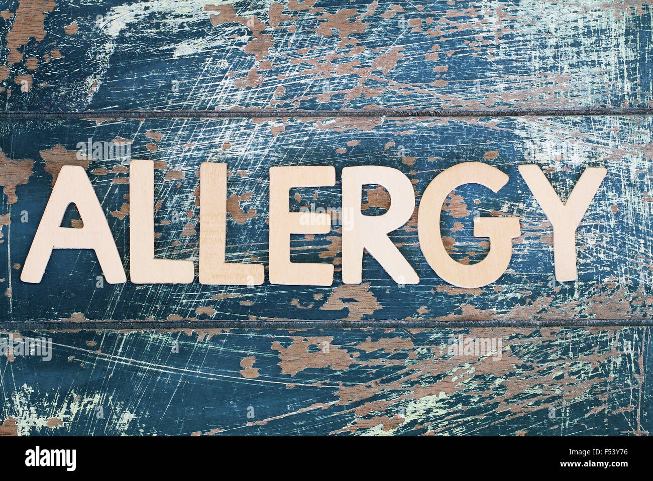 Word allergy written on rustic wooden surface Stock Photo - Alamy