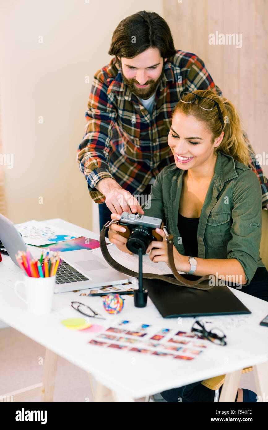 Attractive creative team looking camera hi-res stock photography and ...