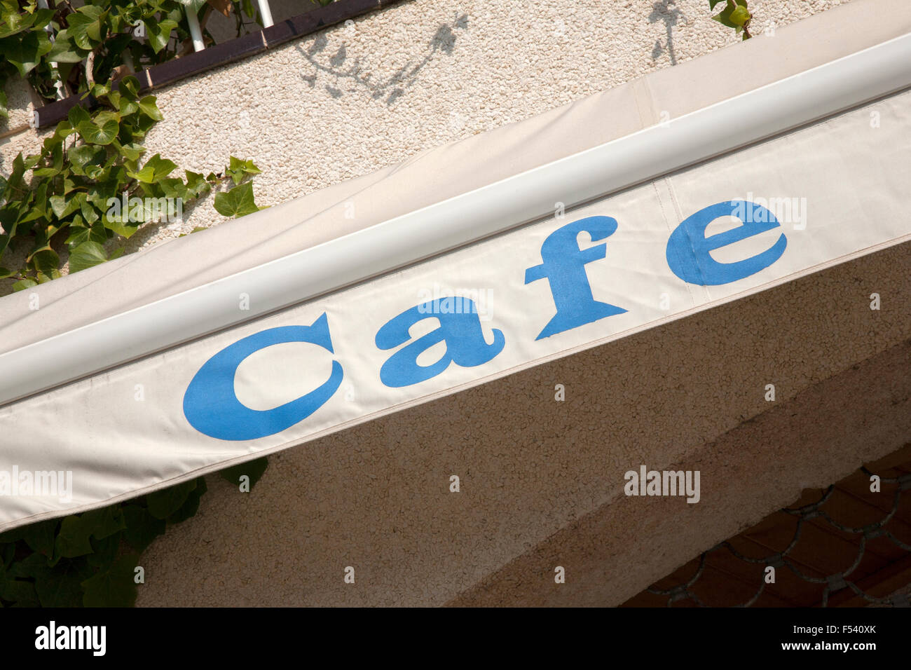 Cafe Sign against Building Background Stock Photo - Alamy