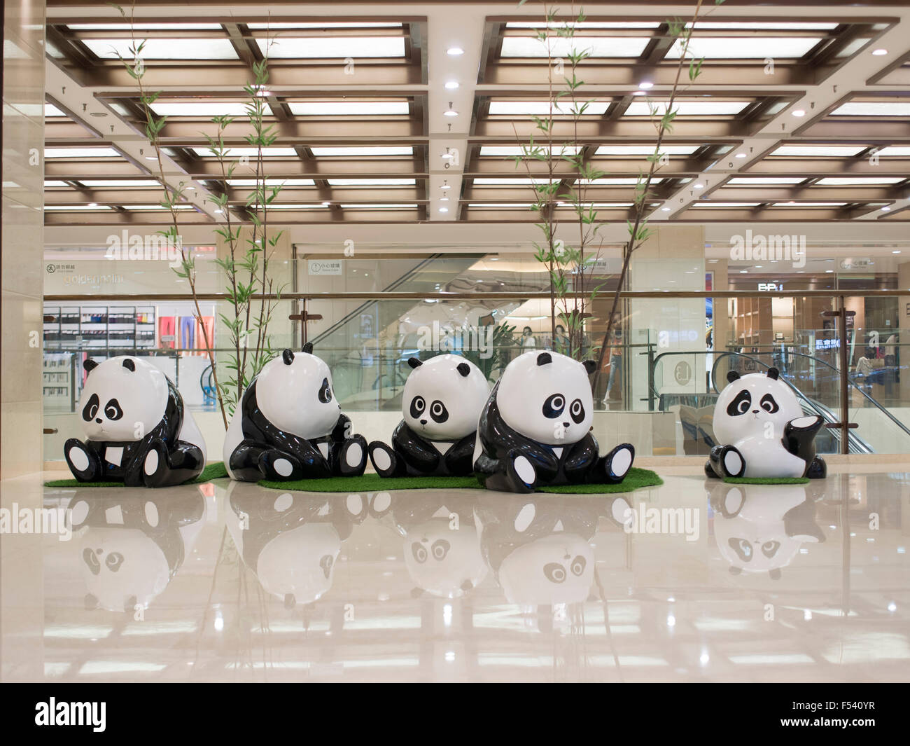 Panda statue be positioned in a shopping mall, to be a mascot Stock ...
