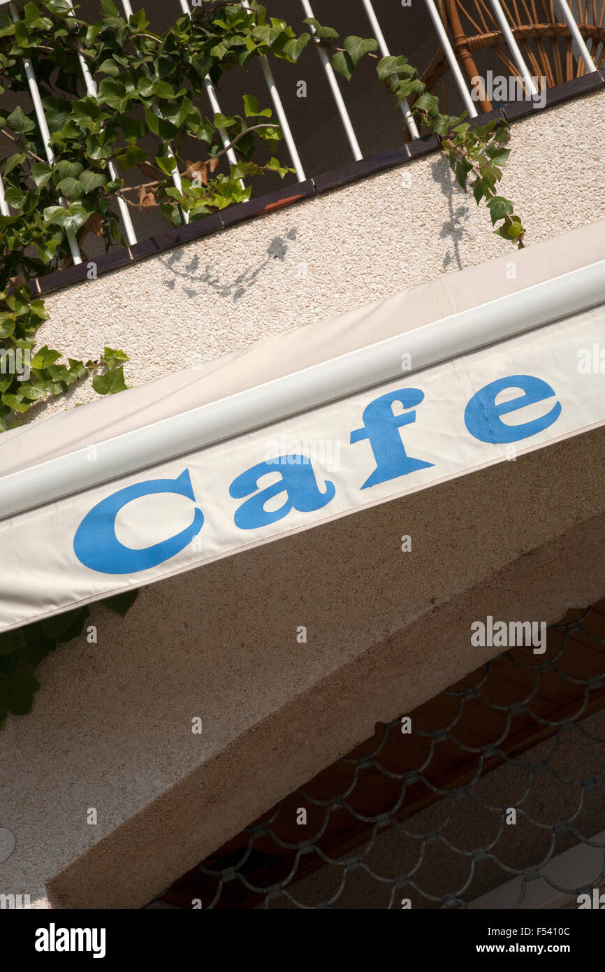 Cafe Sign against Building Background Stock Photo - Alamy