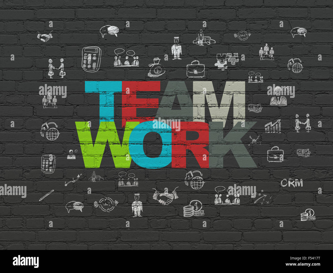 Finance concept: Teamwork on wall background Stock Photo - Alamy