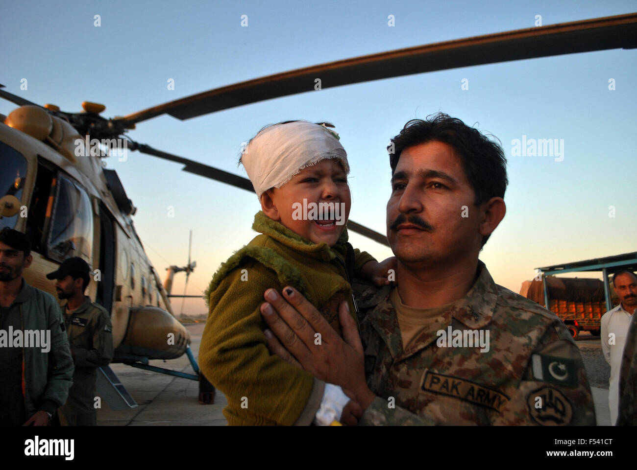 Soldiers rescue child hi-res stock photography and images - Alamy