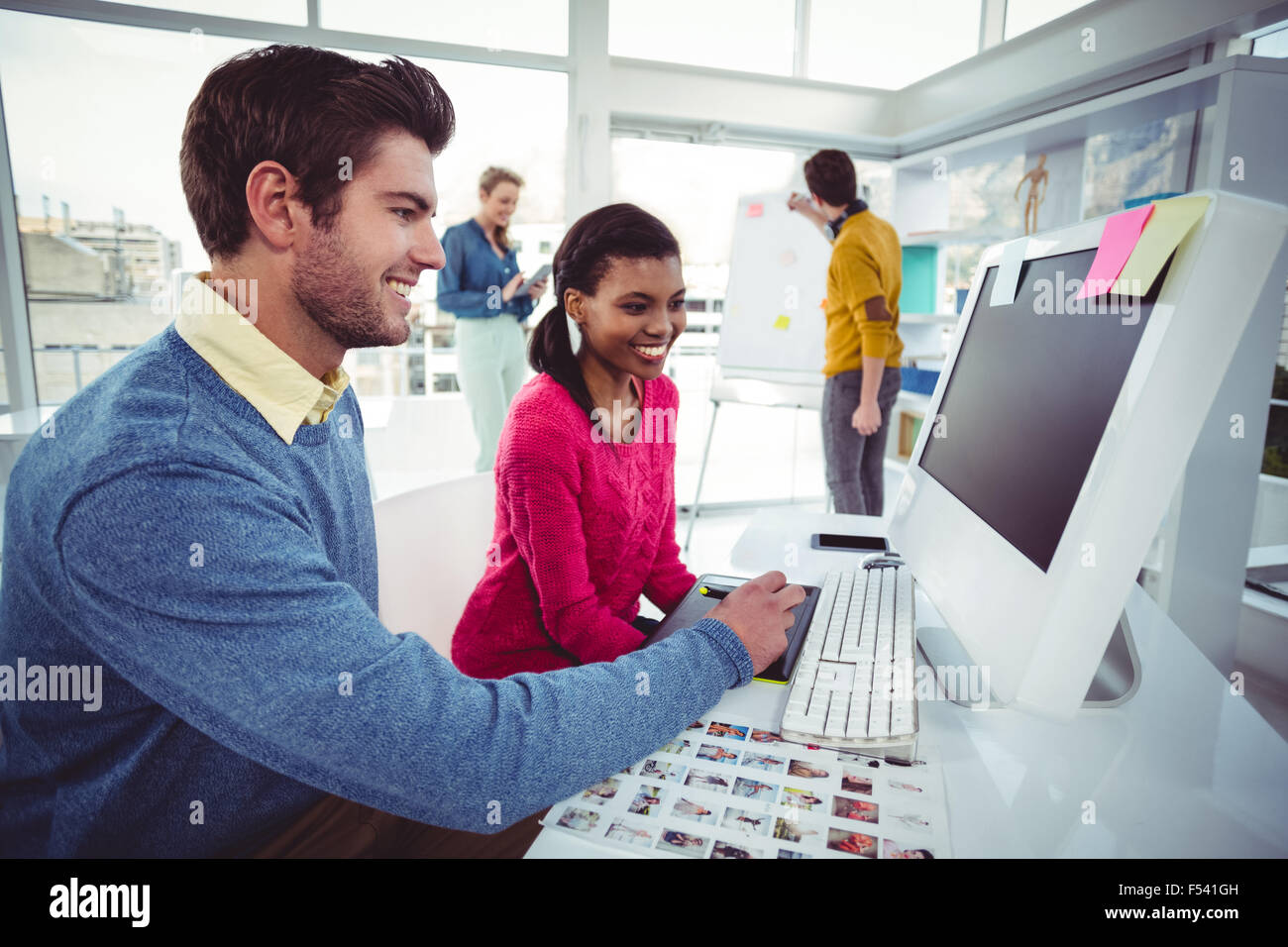 Creative business team working together Stock Photo - Alamy