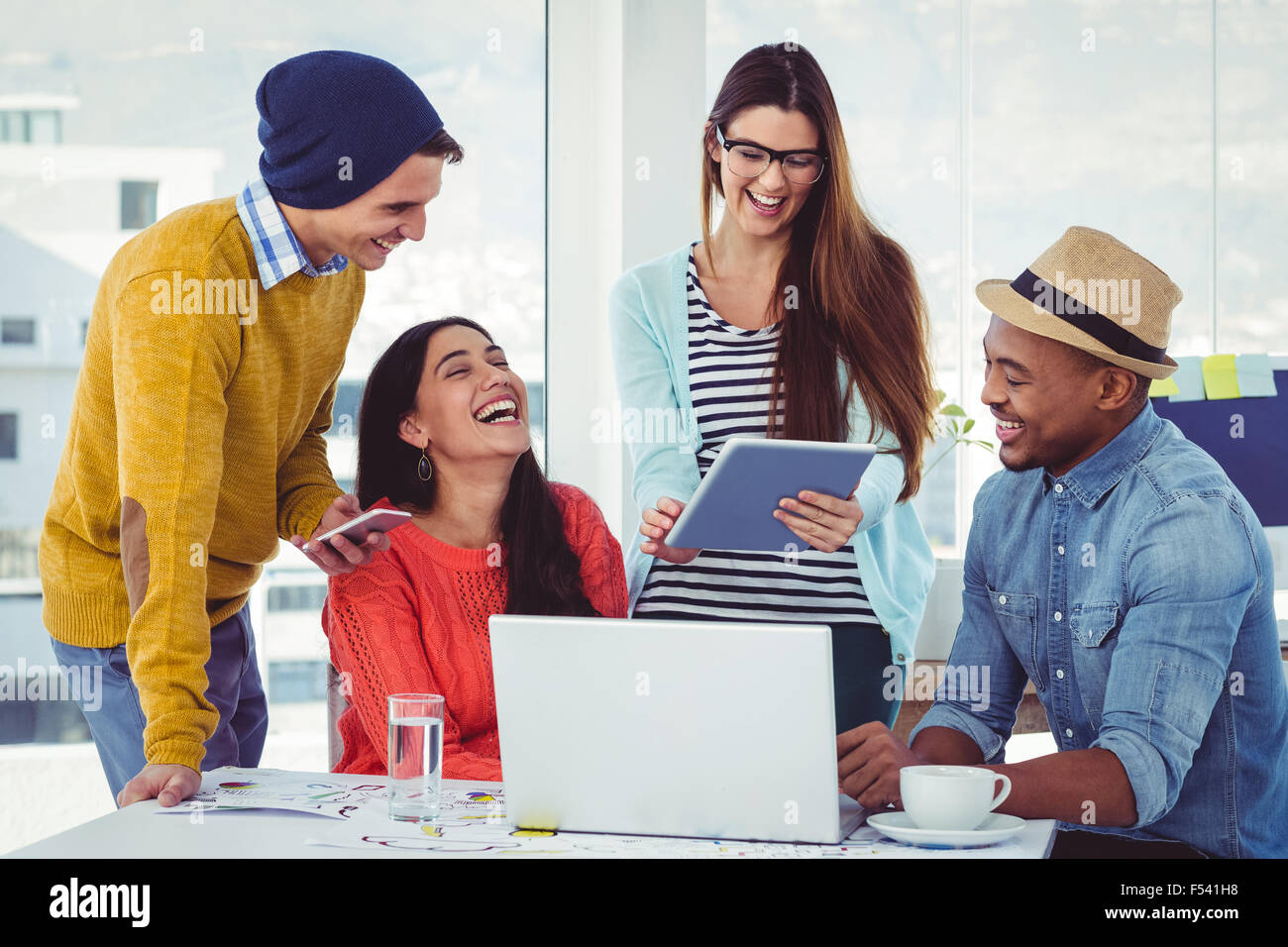 Young creative team having a meeting Stock Photo - Alamy