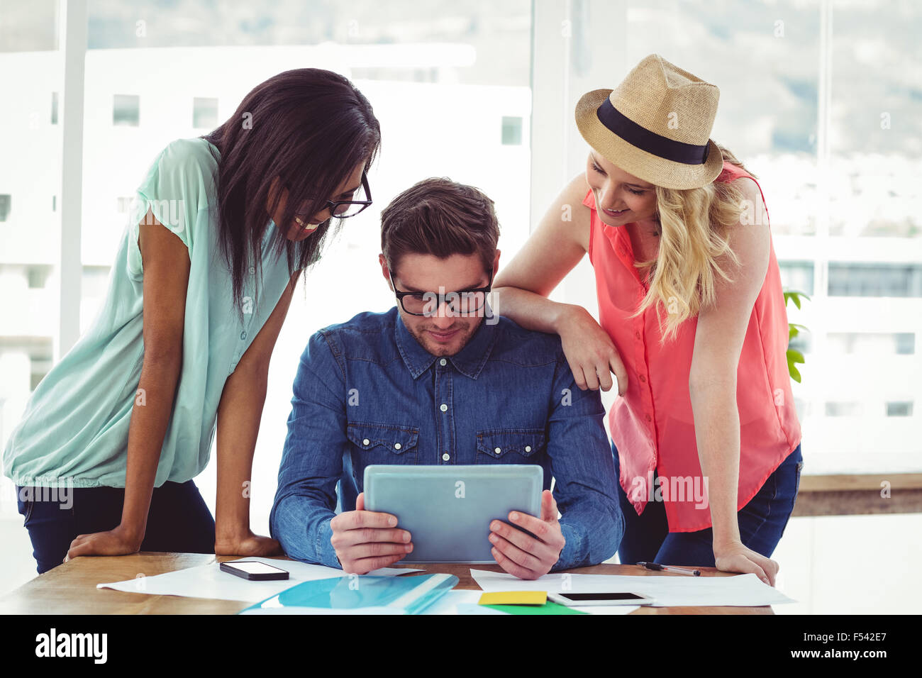 Creative business team working hard together Stock Photo - Alamy