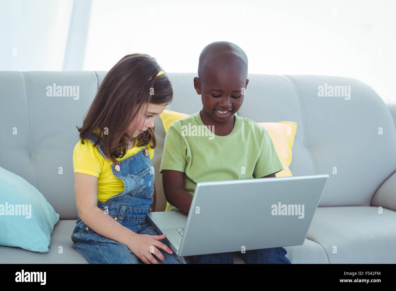 Laptop boy girl hi-res stock photography and images - Alamy