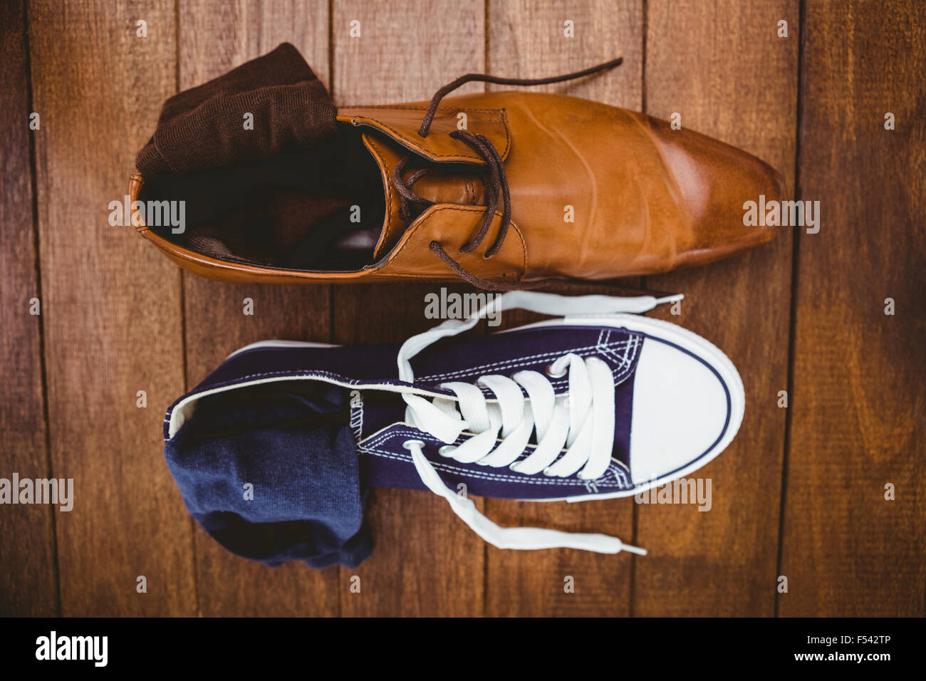 View of two different shoes Stock Photo - Alamy