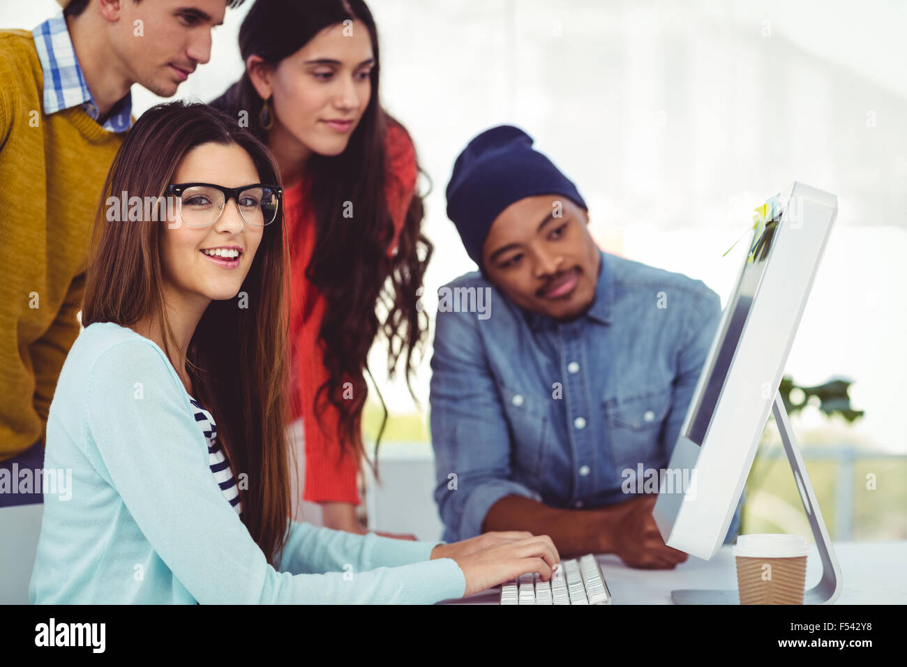 Young creative team having a meeting Stock Photo - Alamy