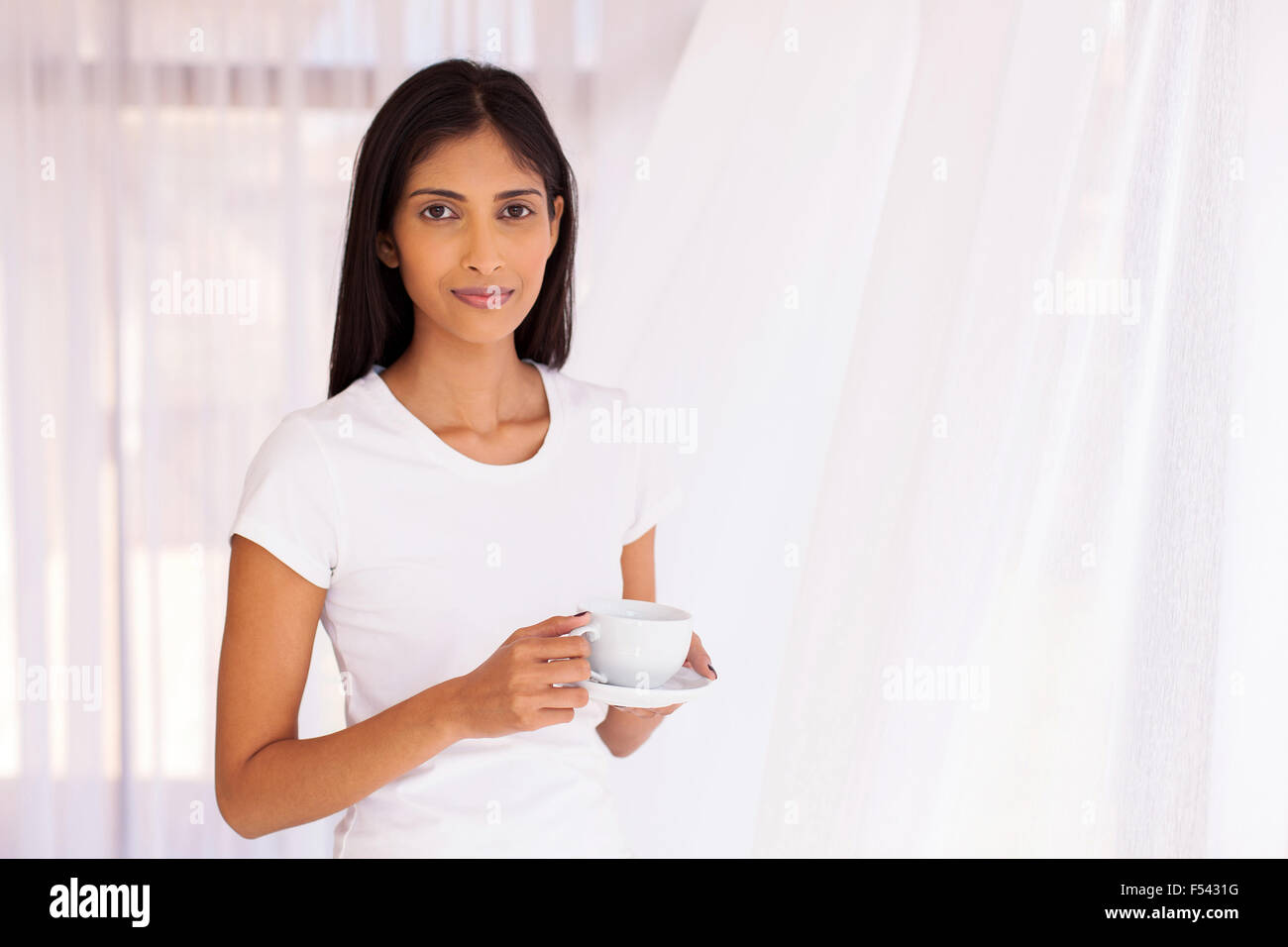 Indian woman drinking tea hi-res stock photography and images - Alamy