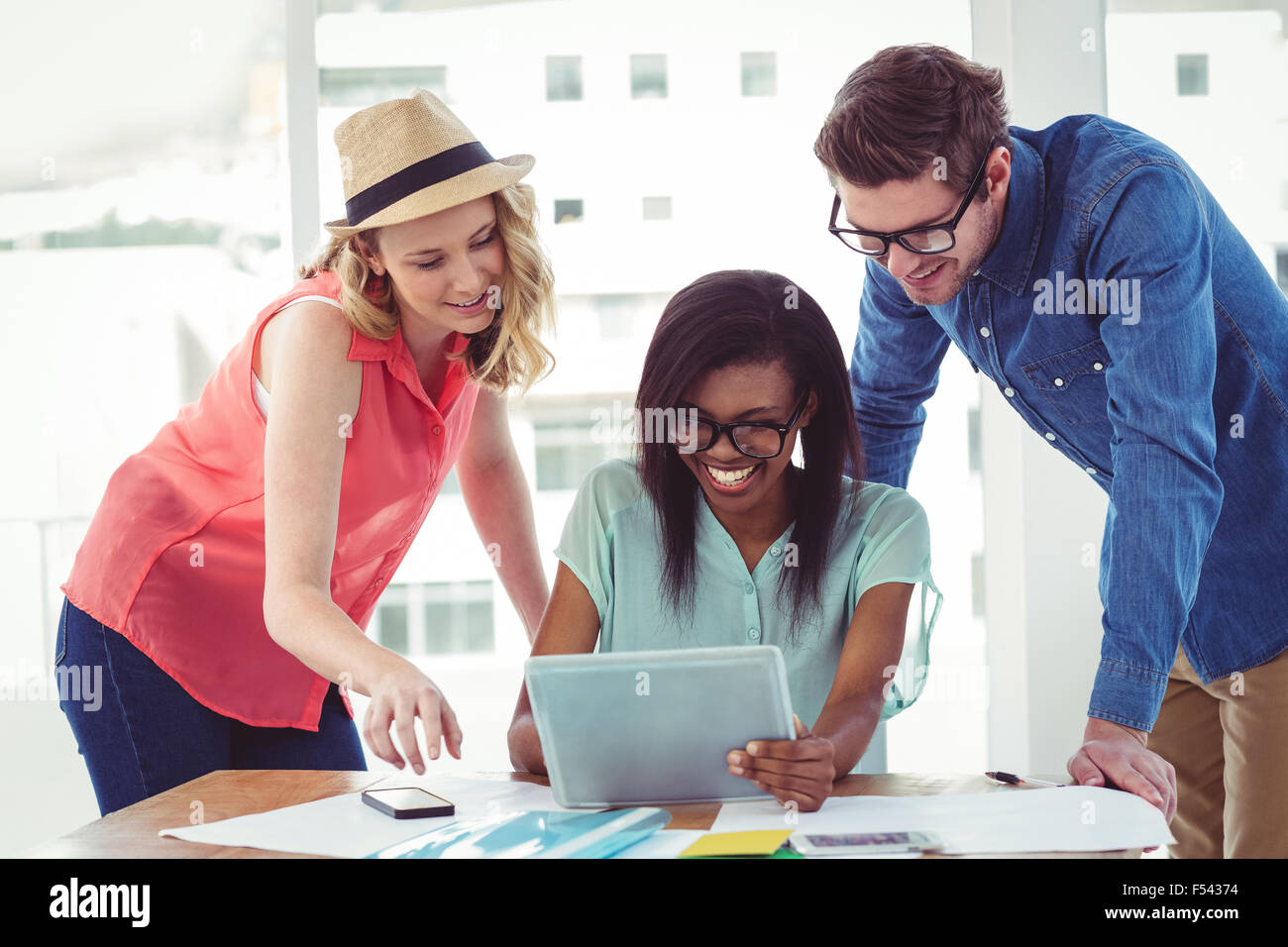 Creative business team working hard together Stock Photo - Alamy