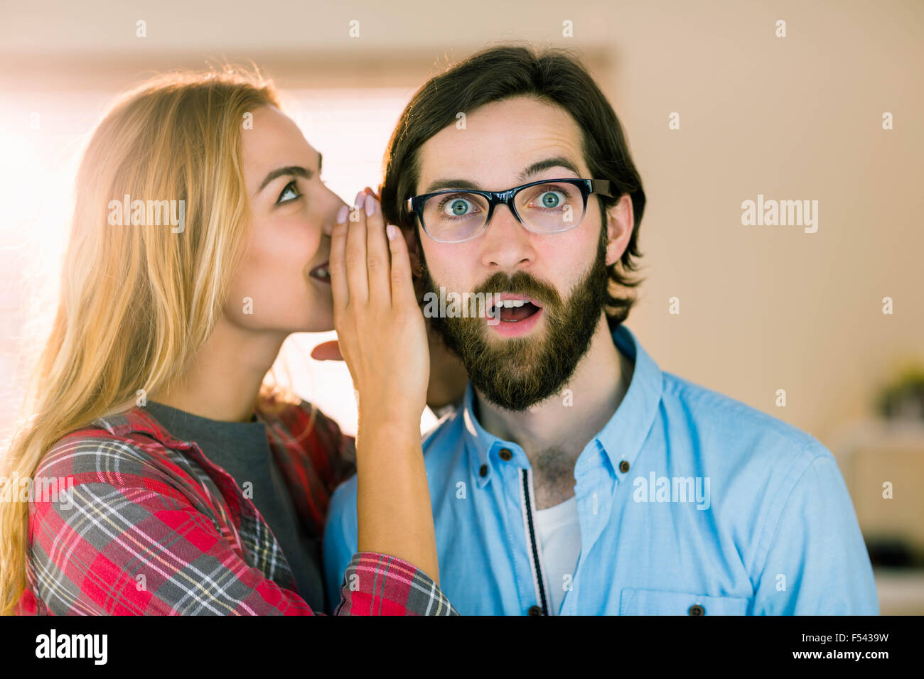 Creative team gossiping Stock Photo - Alamy
