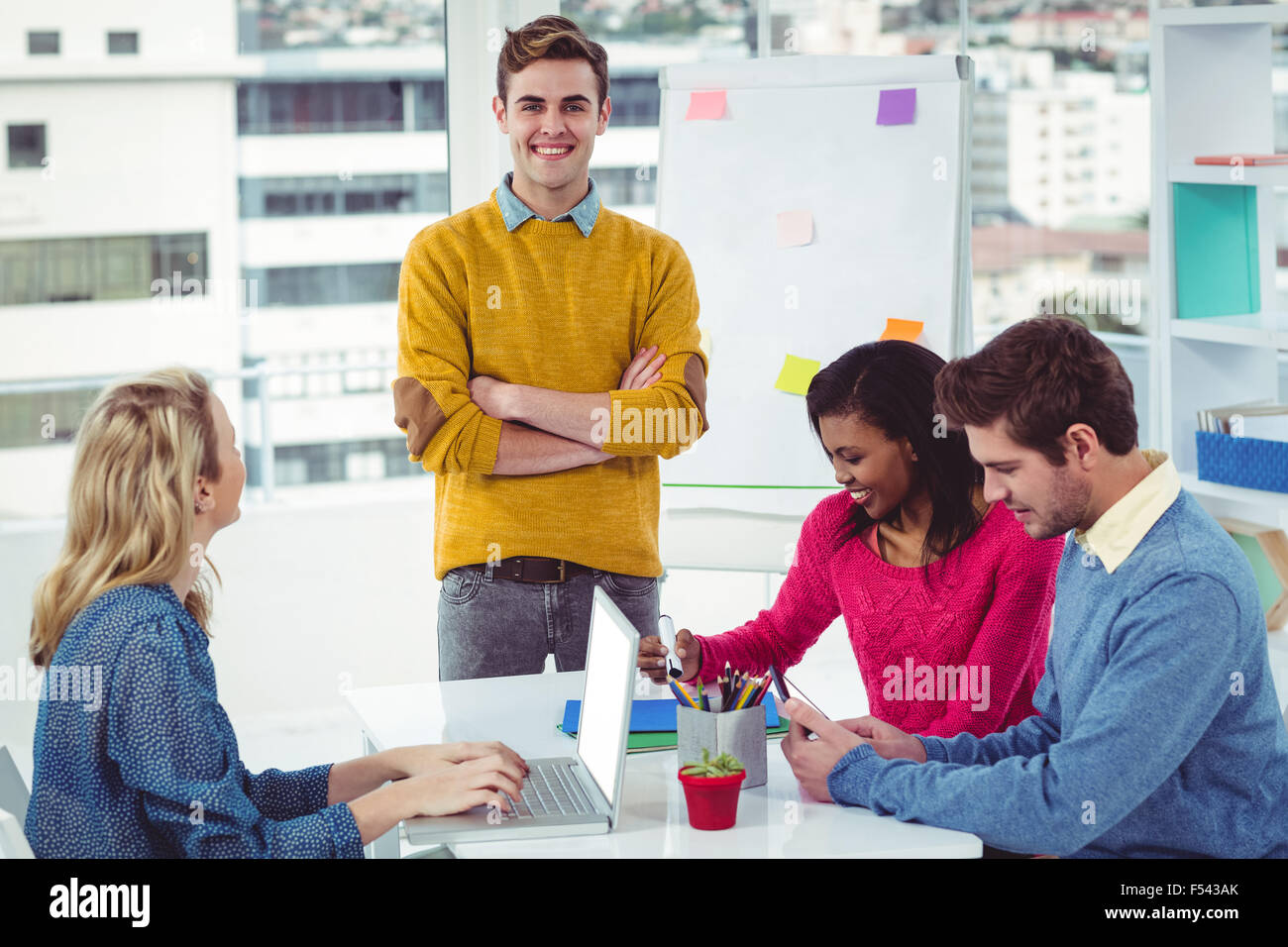 Creative business team working hard together Stock Photo - Alamy