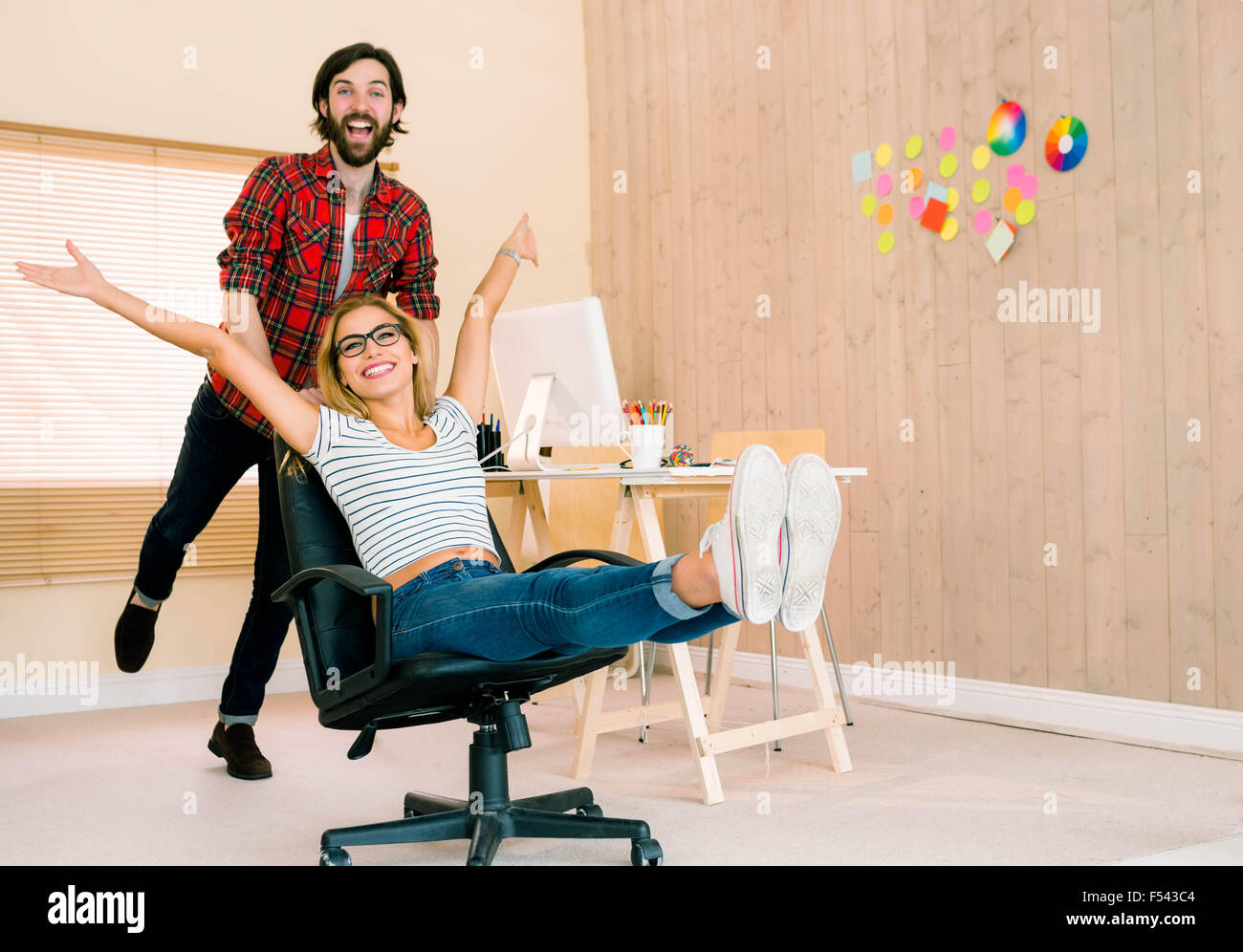 Creative team having fun together Stock Photo - Alamy