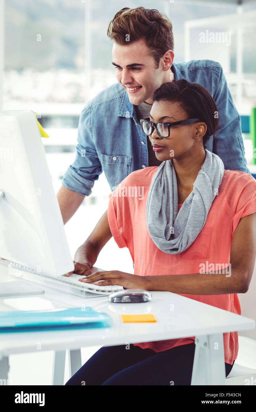 Creative business team working hard together Stock Photo - Alamy