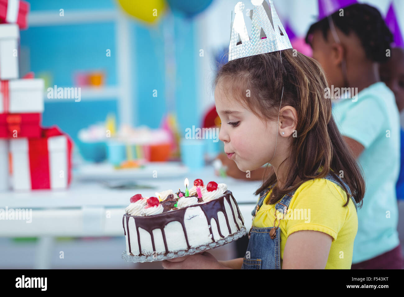 Holding birthday cake hi-res stock photography and images - Alamy