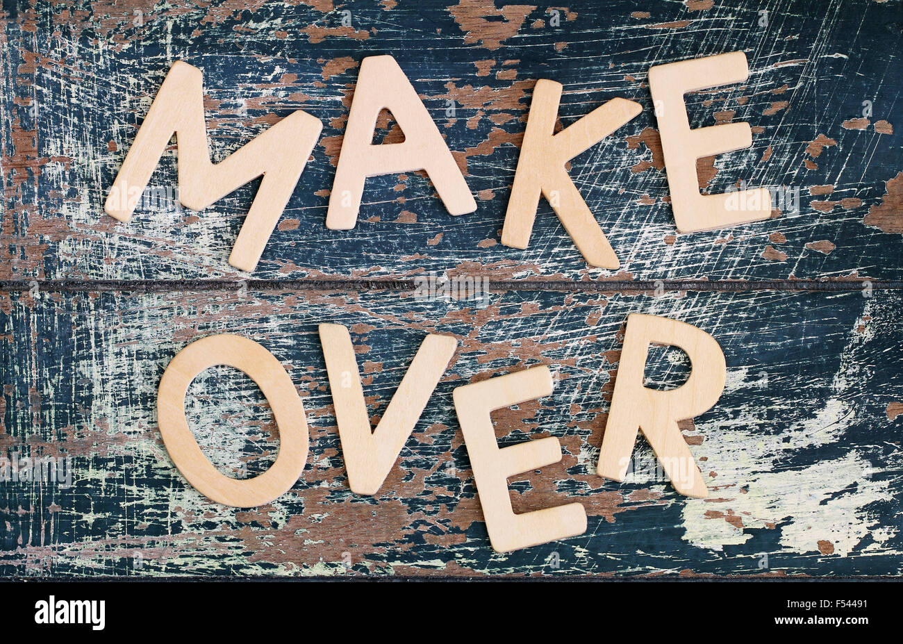 Makeover written with wooden letters on rustic wooden surface Stock ...
