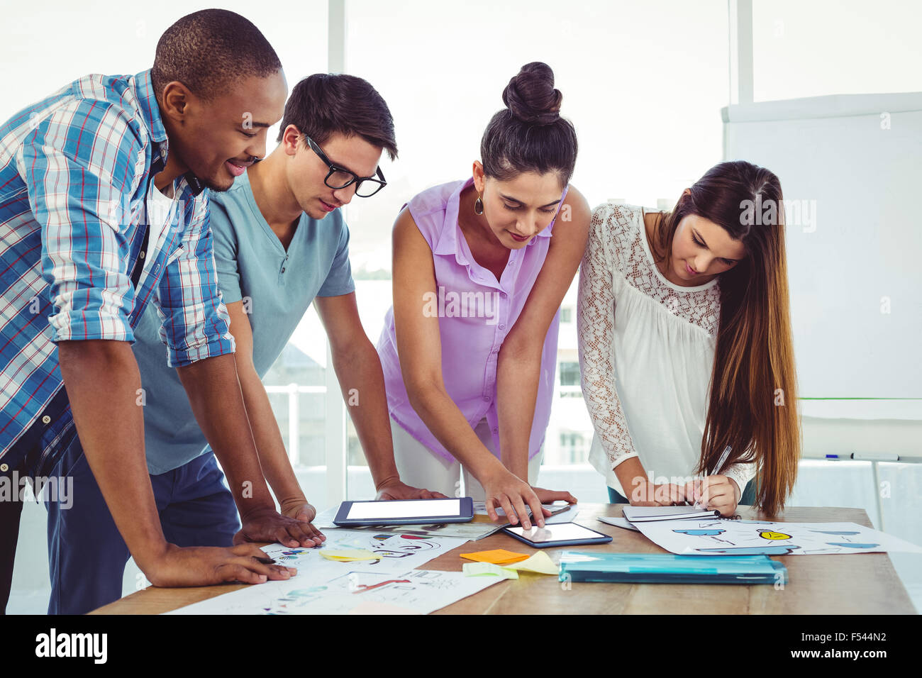 Creative business team at meeting Stock Photo - Alamy