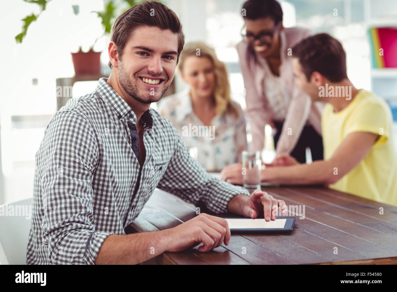 Creative business team working hard together Stock Photo - Alamy