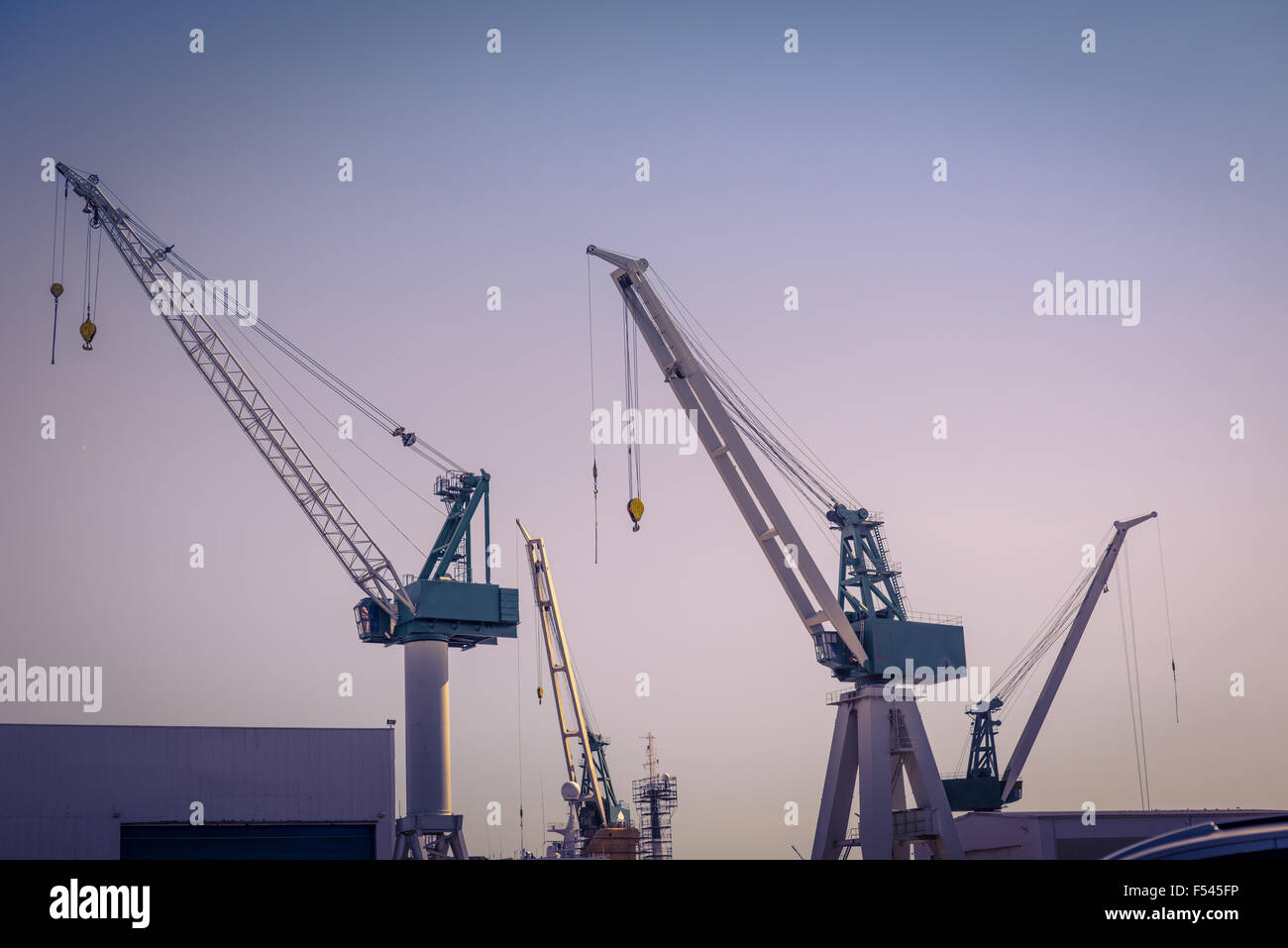 Harbor view with cargo cranes hi-res stock photography and images - Alamy