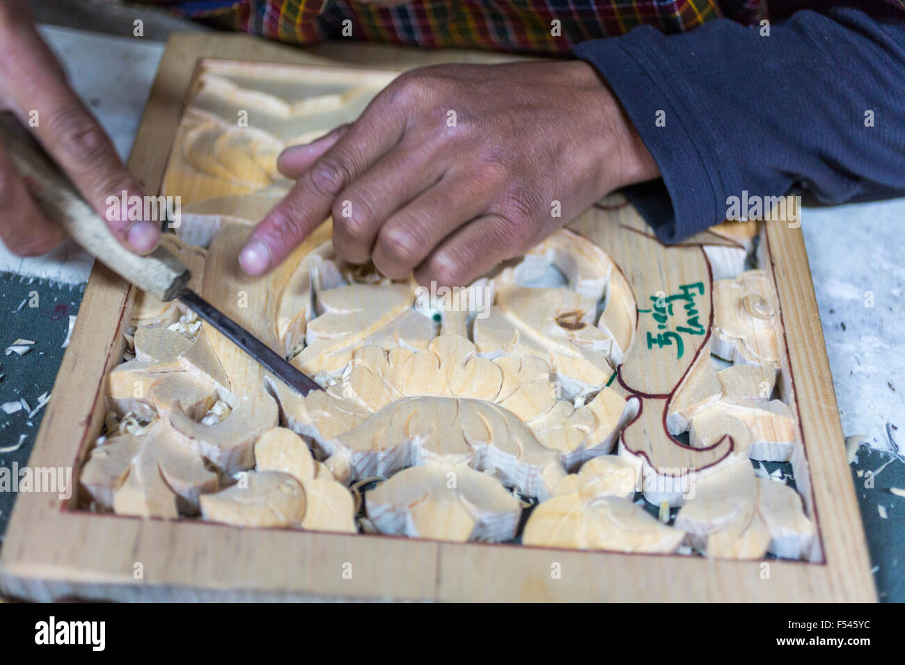 Wood carving lesson at the National Institute for Zorig Chusum, Thimphu ...