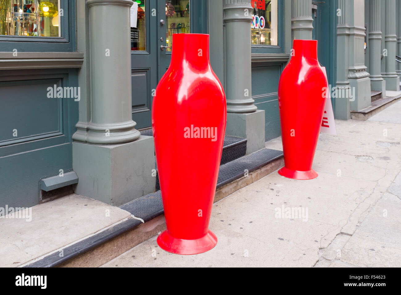 Pair of large red vases outside the entrance to a gallery in Manhattan ...