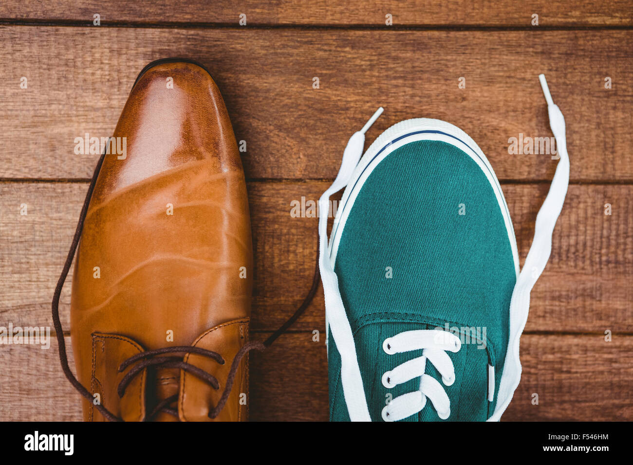 View of two different shoes Stock Photo - Alamy