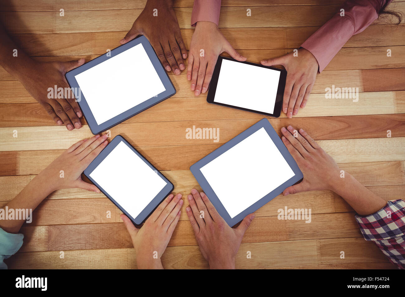 Young creative team using tablets Stock Photo - Alamy