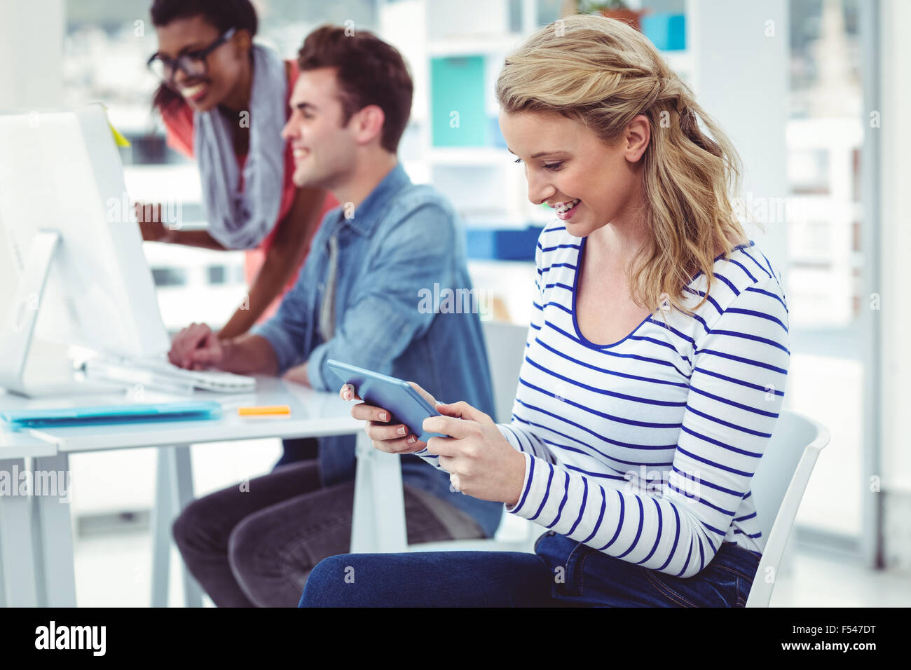Creative business team working hard together Stock Photo - Alamy