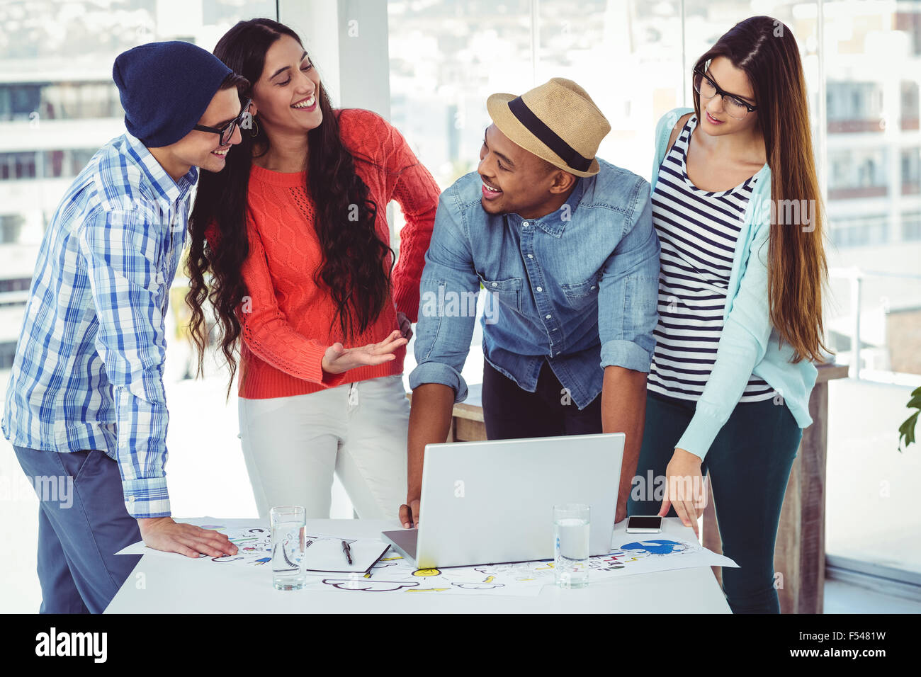 Young creative team having a meeting Stock Photo - Alamy