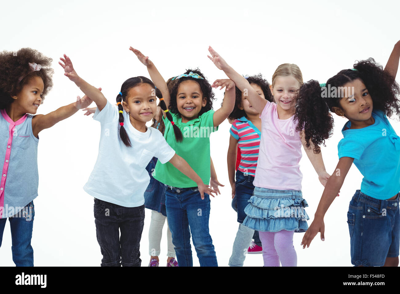 Girls standing with arms spread out Stock Photo - Alamy