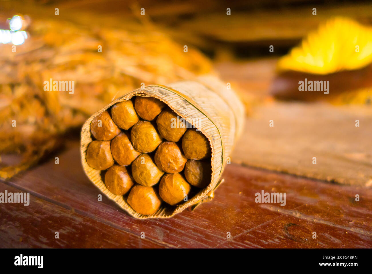 Handmade cigar live preparation, artisan made and packed Stock Photo ...