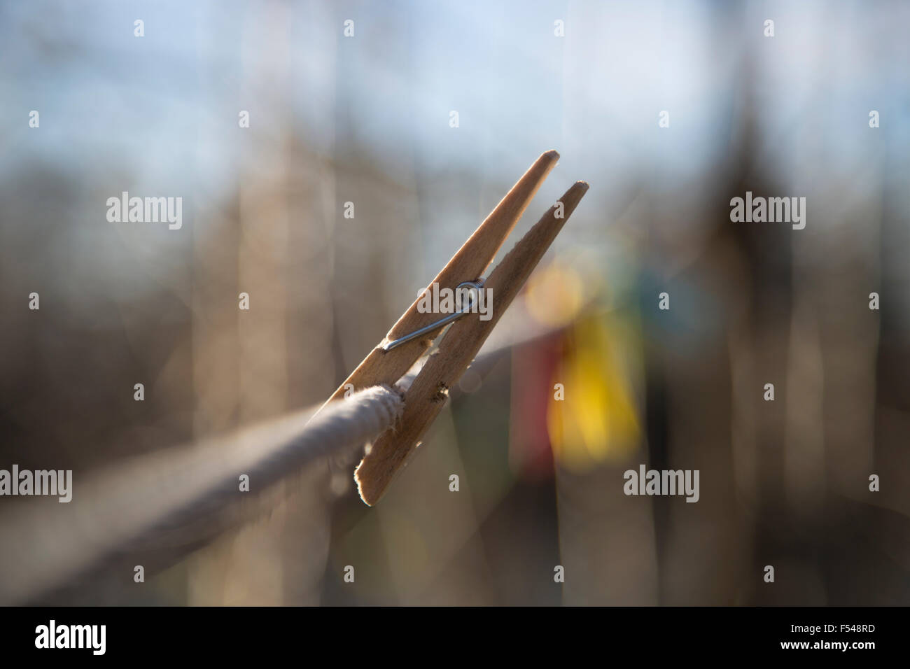 Wooden Clothes Pin on Clothes Line Stock Photo - Alamy