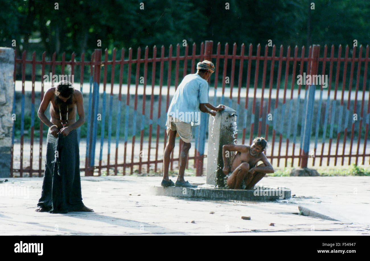 Man washing in a water fountain in Delhi India - 1992 Photograph taken ...
