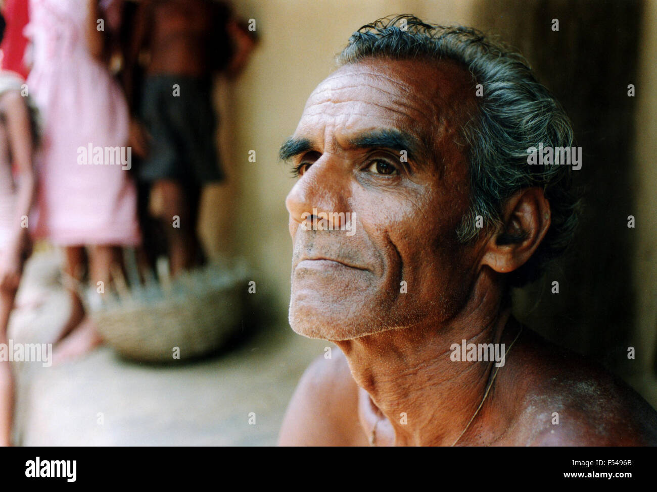 Portrait of a proud man living in village in the rain forests in the ...